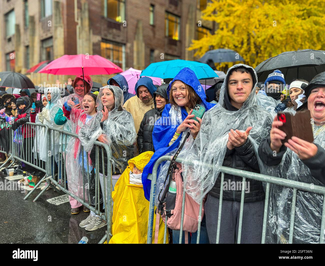 New York, New York, November 28, 2024: A crowd of people watching the ...