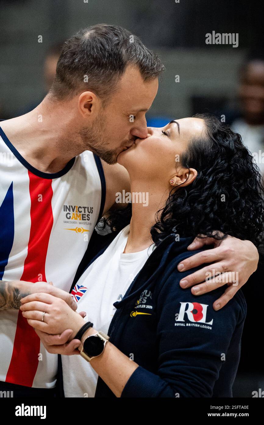 Army veteran James Cairns kisses his partner Hannah Wild after he ...