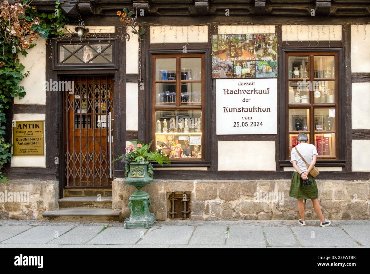 Antique shop window display in the old town of Quedlinburg, Germany ...