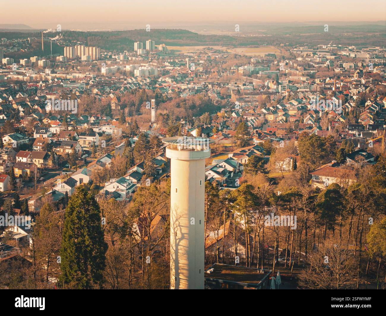 Detailed image of a town with a central tower and surrounding buildings ...