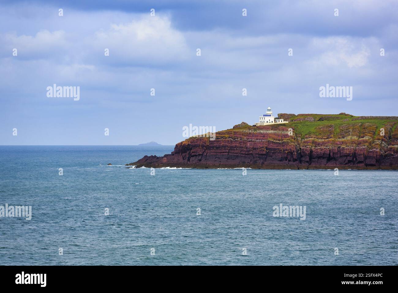Lighthouse on the cliffs, St Ann's Head Lighthouse at the entrance to ...