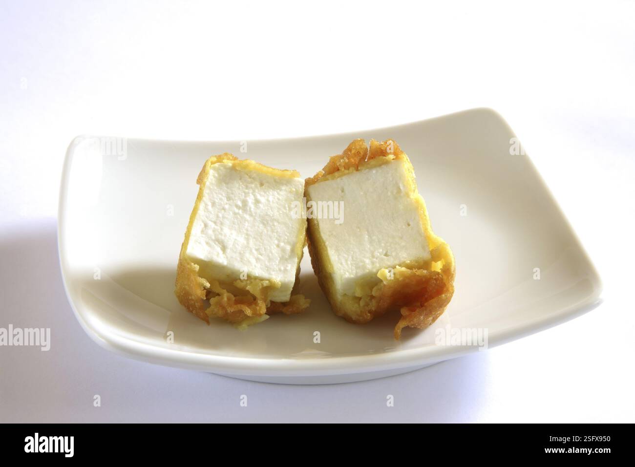 Indian cuisine, fast food starters Cheese Pakode puffs served in dish ...