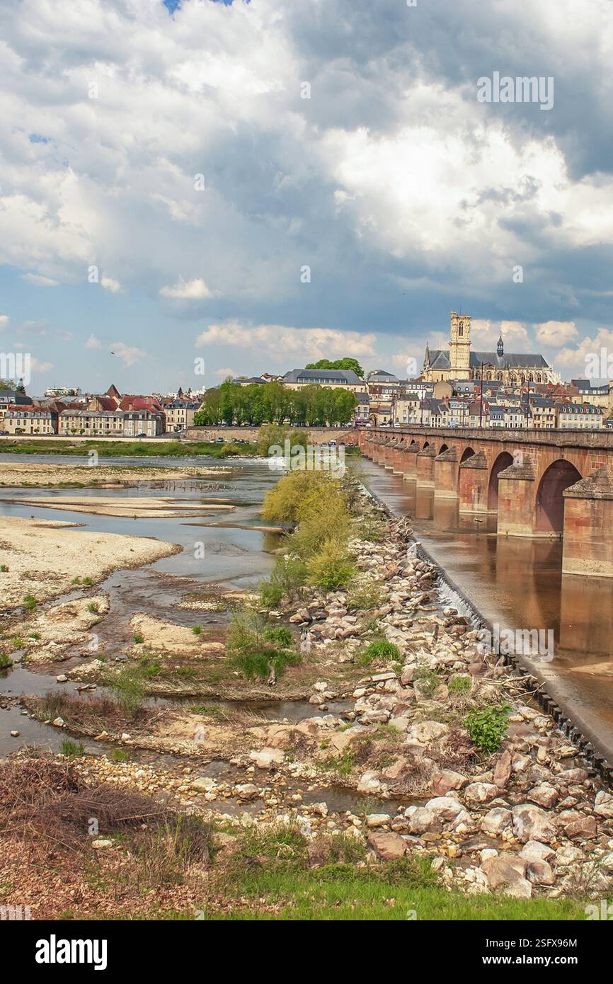 The view of Nevers on the Loire with its cathedral and the red ...