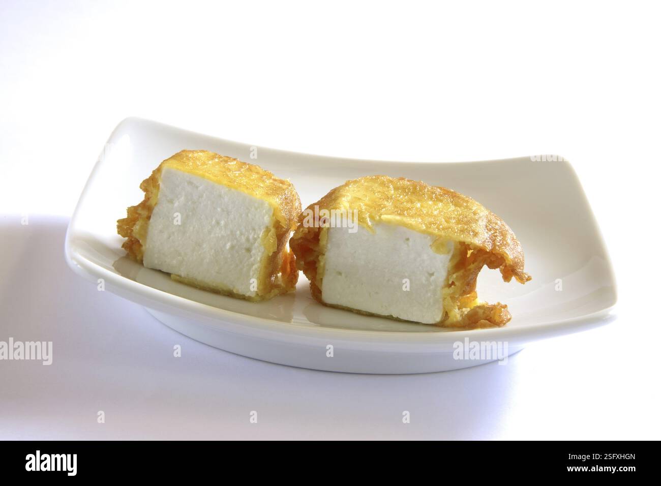 Indian cuisine, fast food starters Cheese Pakode puffs served in dish ...