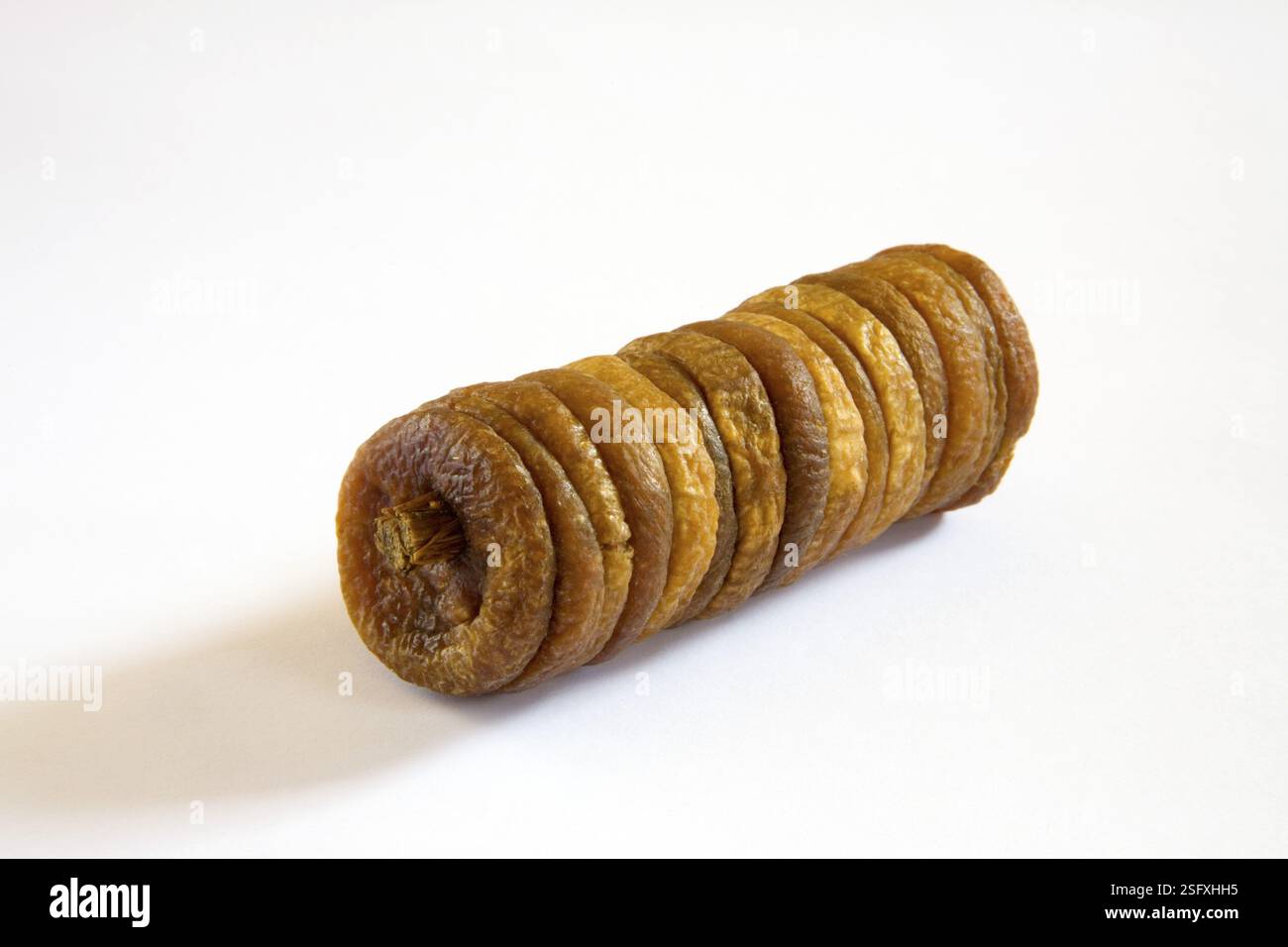 Dry Fruits, Anjir Fig arrange in row on white background Stock Photo ...