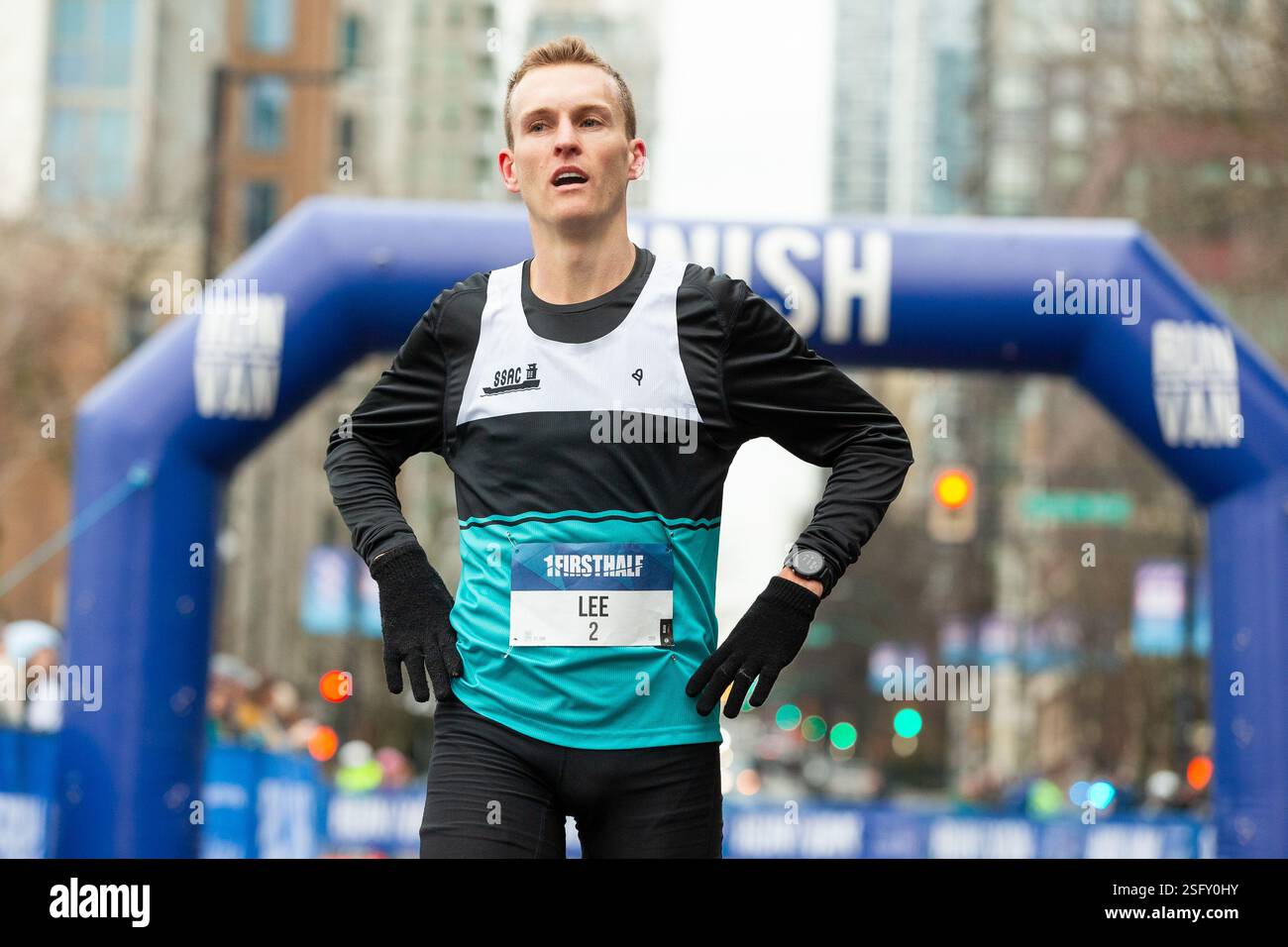 Vancouver, Canada - 9 Feb, 2025. Lee Wesselius crossing the finish line for second place at the ...