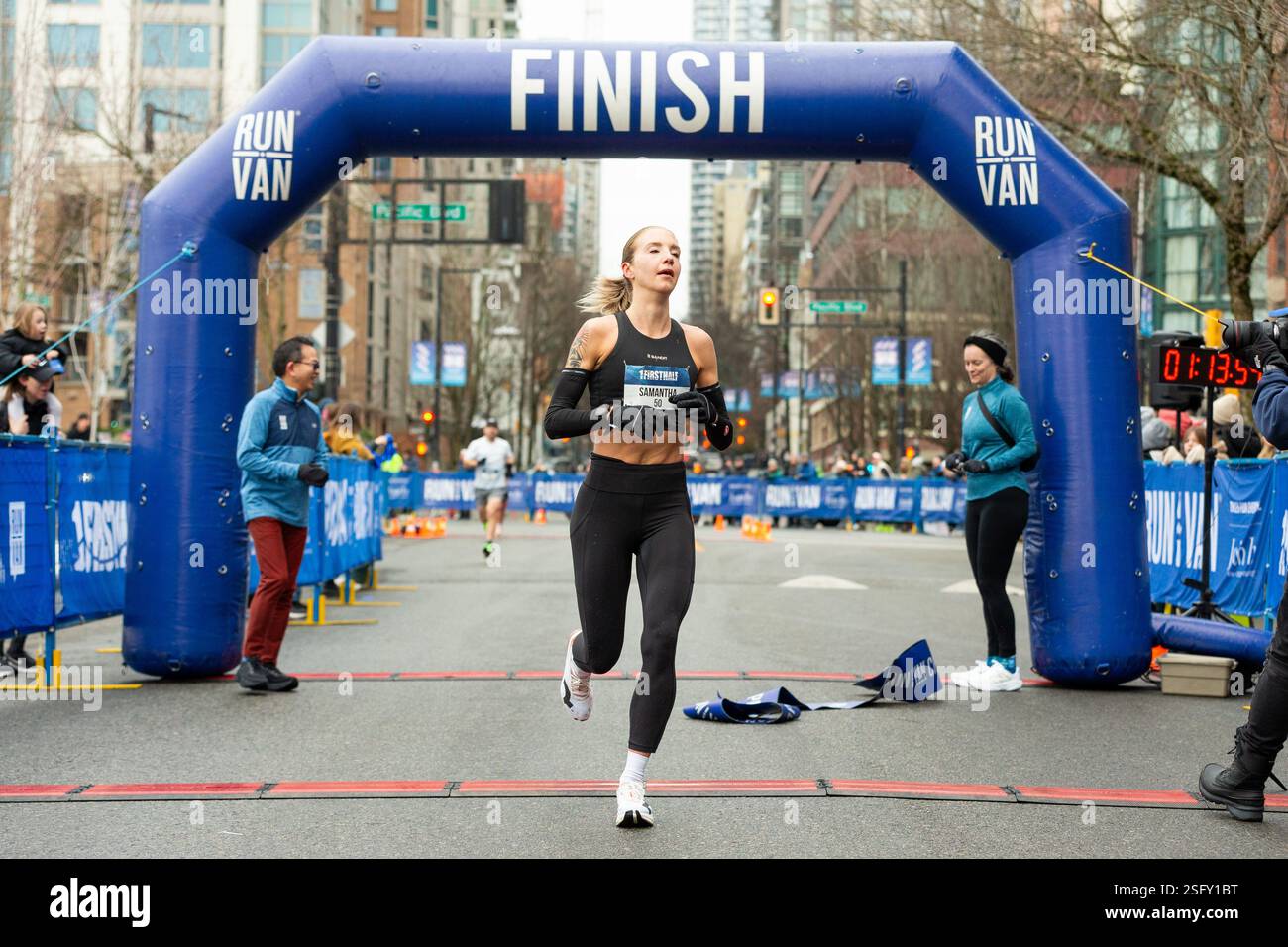Vancouver, Canada - 9 Feb, 2025. Samantha Jory crossing the finish line ...