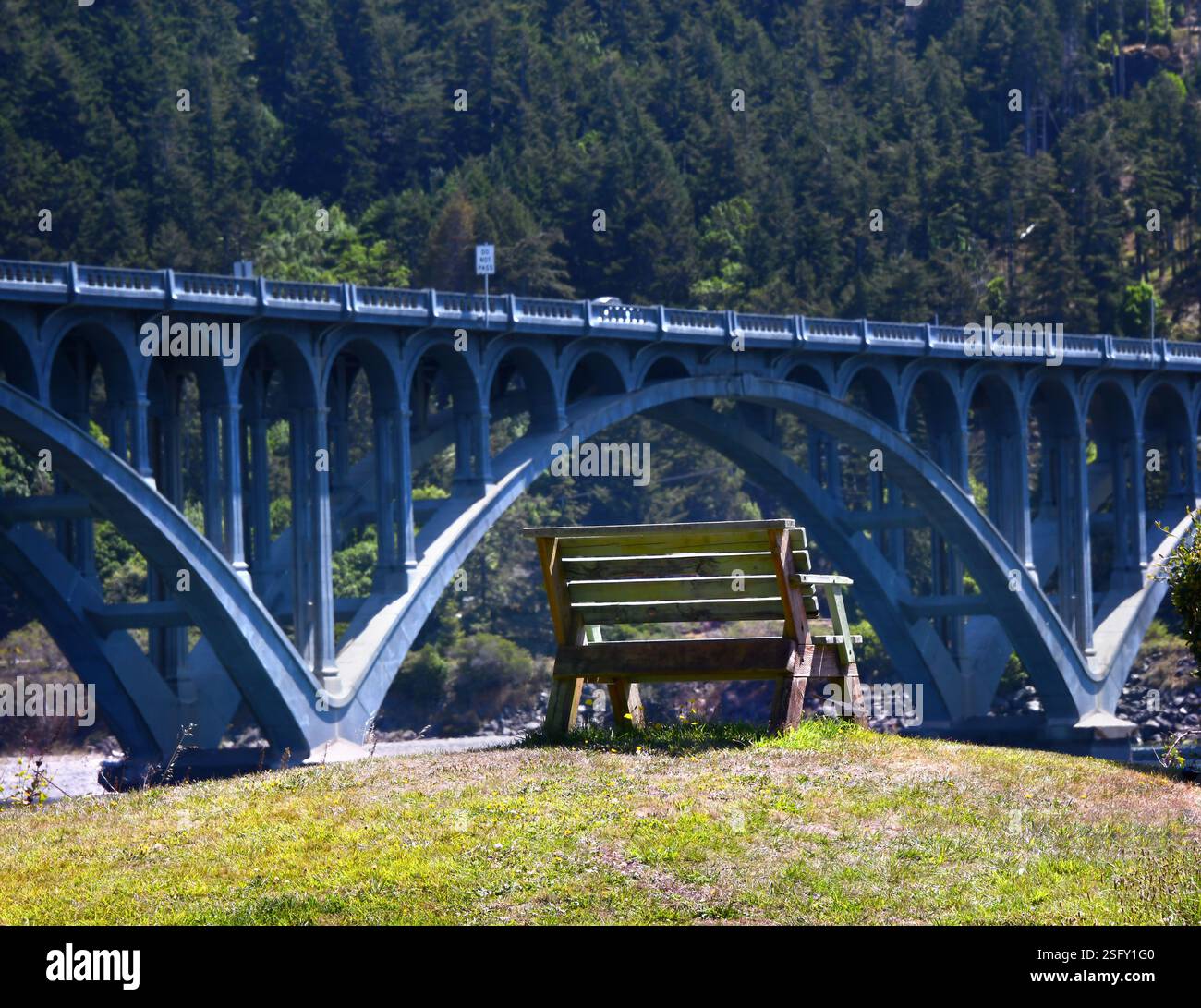 Bench seat, on bluff, provides view of the Isaac Lee Patterson Bridge ...