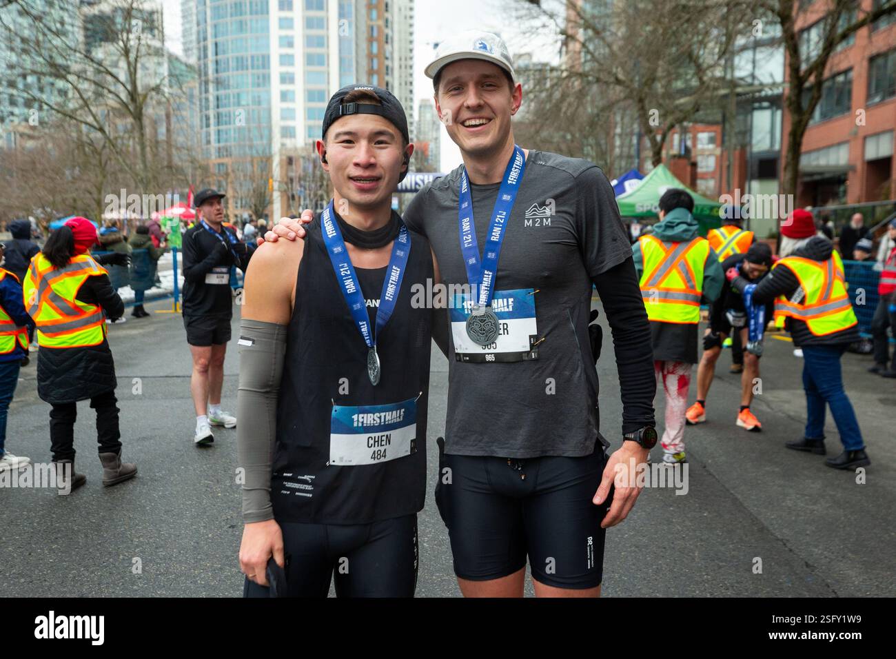 Vancouver, Canada - 9 Feb, 2025. Runners stand for photo with their ...