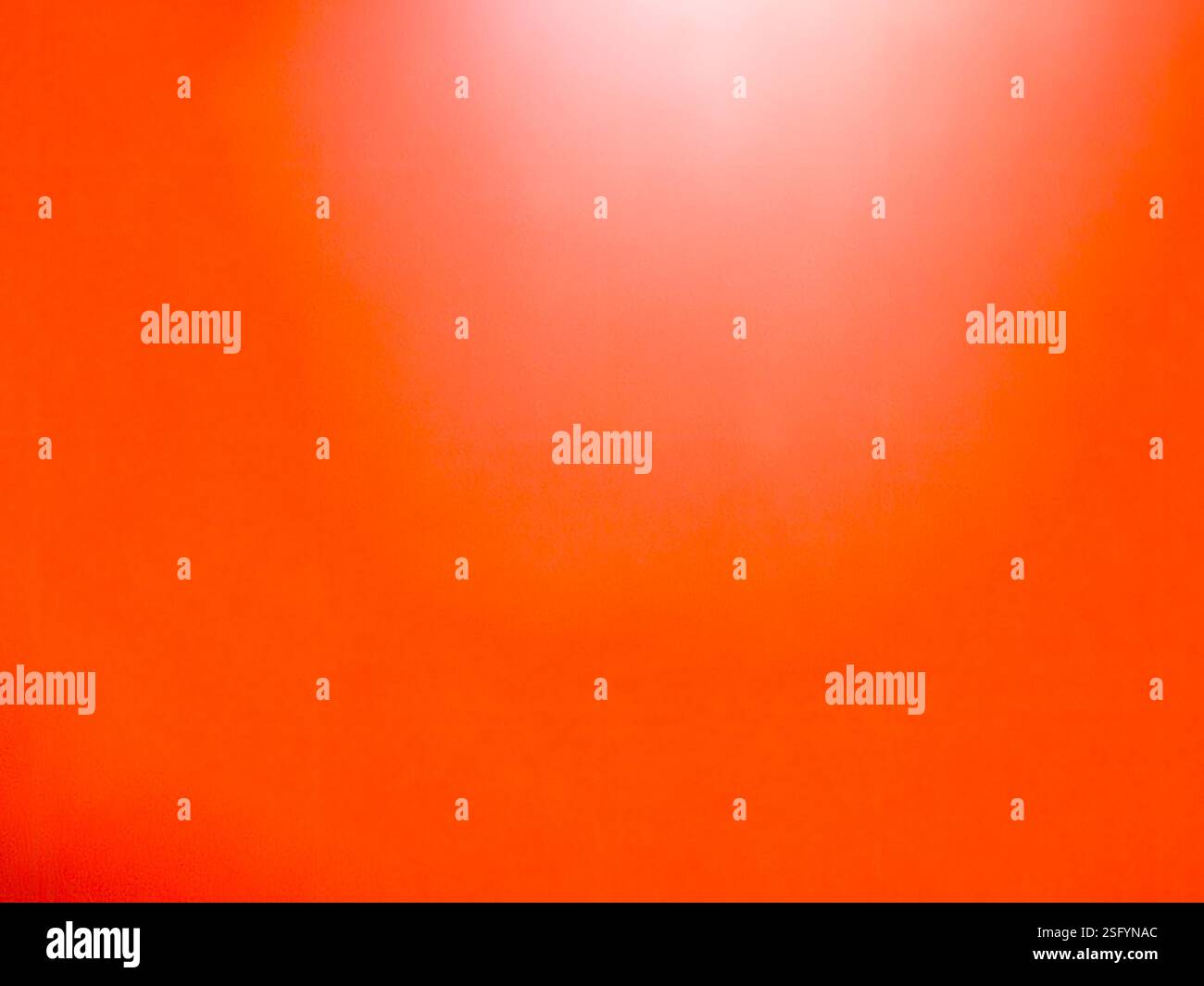 A predominantly orange background features a gradient effect, with a ...