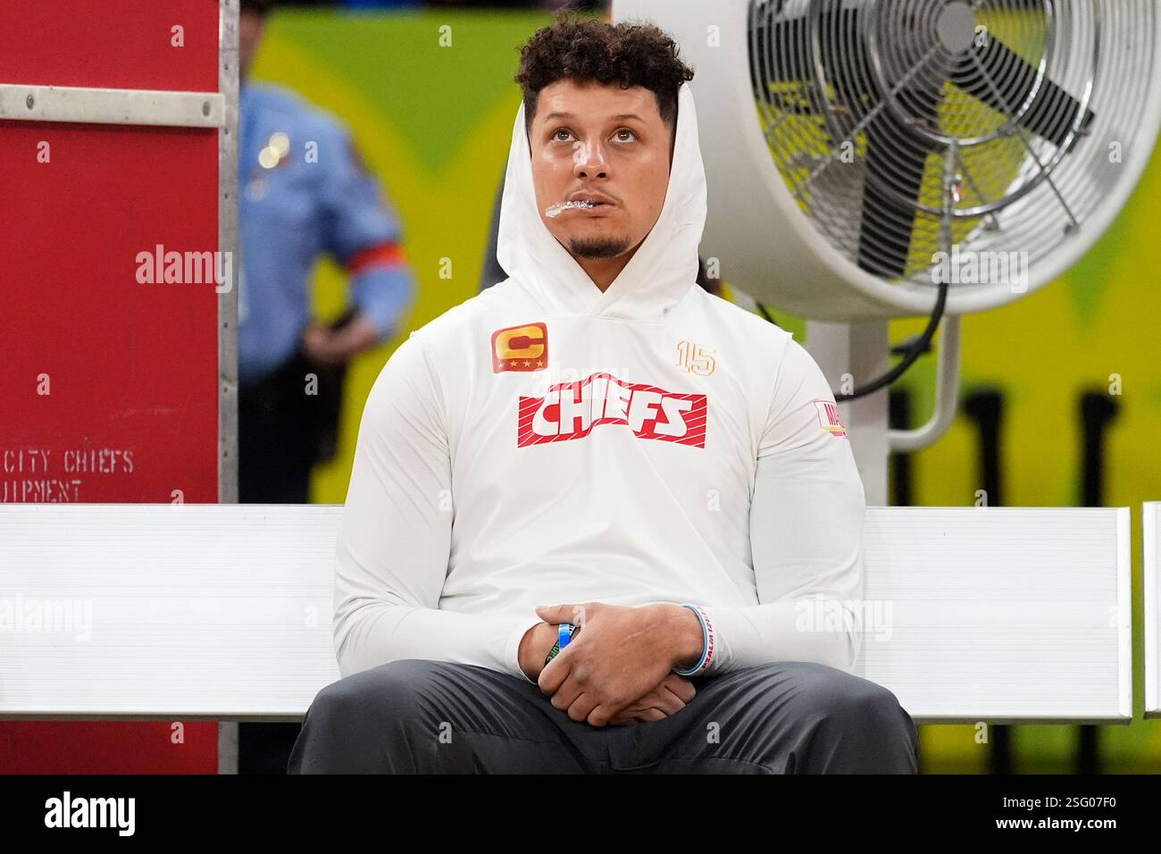 Kansas City Chiefs quarterback Patrick Mahomes sits on the bench prior ...