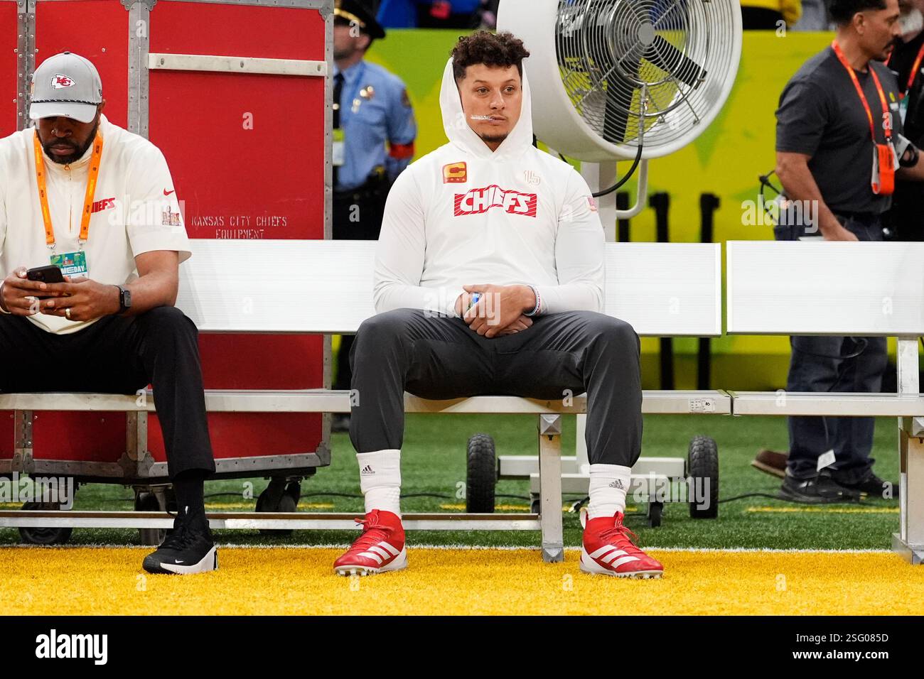 Kansas City Chiefs quarterback Patrick Mahomes sits on the bench prior ...