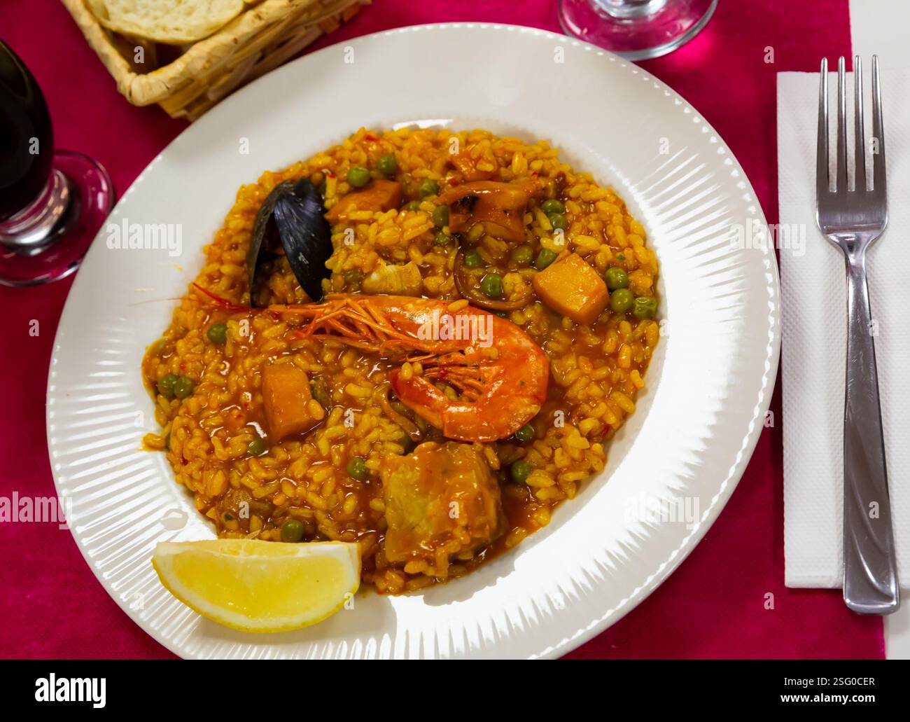 Spainsh dish seafood paella with rice, shrimps and mussels Stock Photo ...