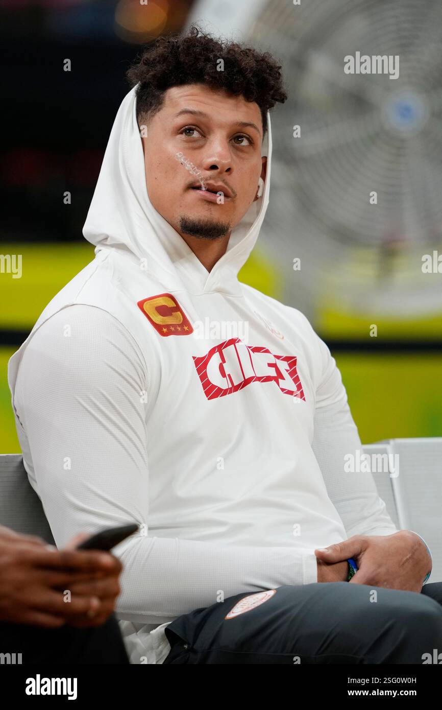 Kansas City Chiefs quarterback Patrick Mahomes looks on before the NFL ...