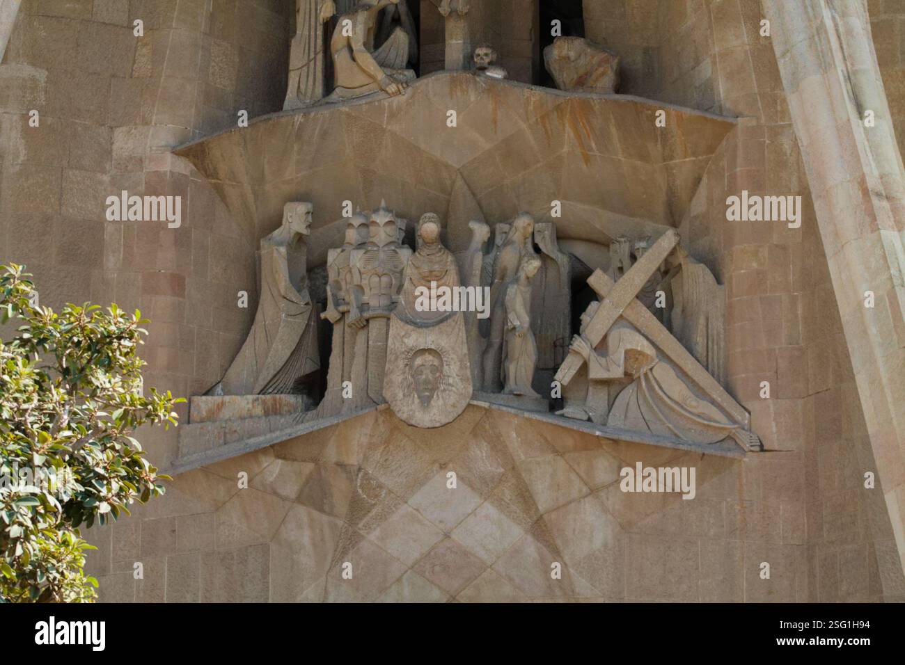 A close-up view of a stone sculpture on a building facade, featuring ...