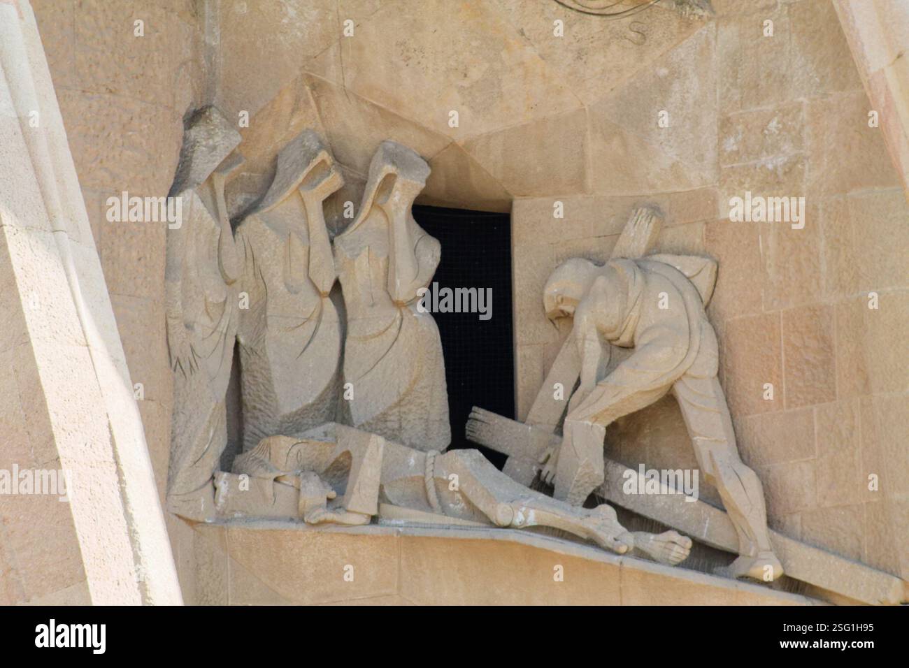 A stone sculpture depicting a scene of mourning and labor, featuring ...