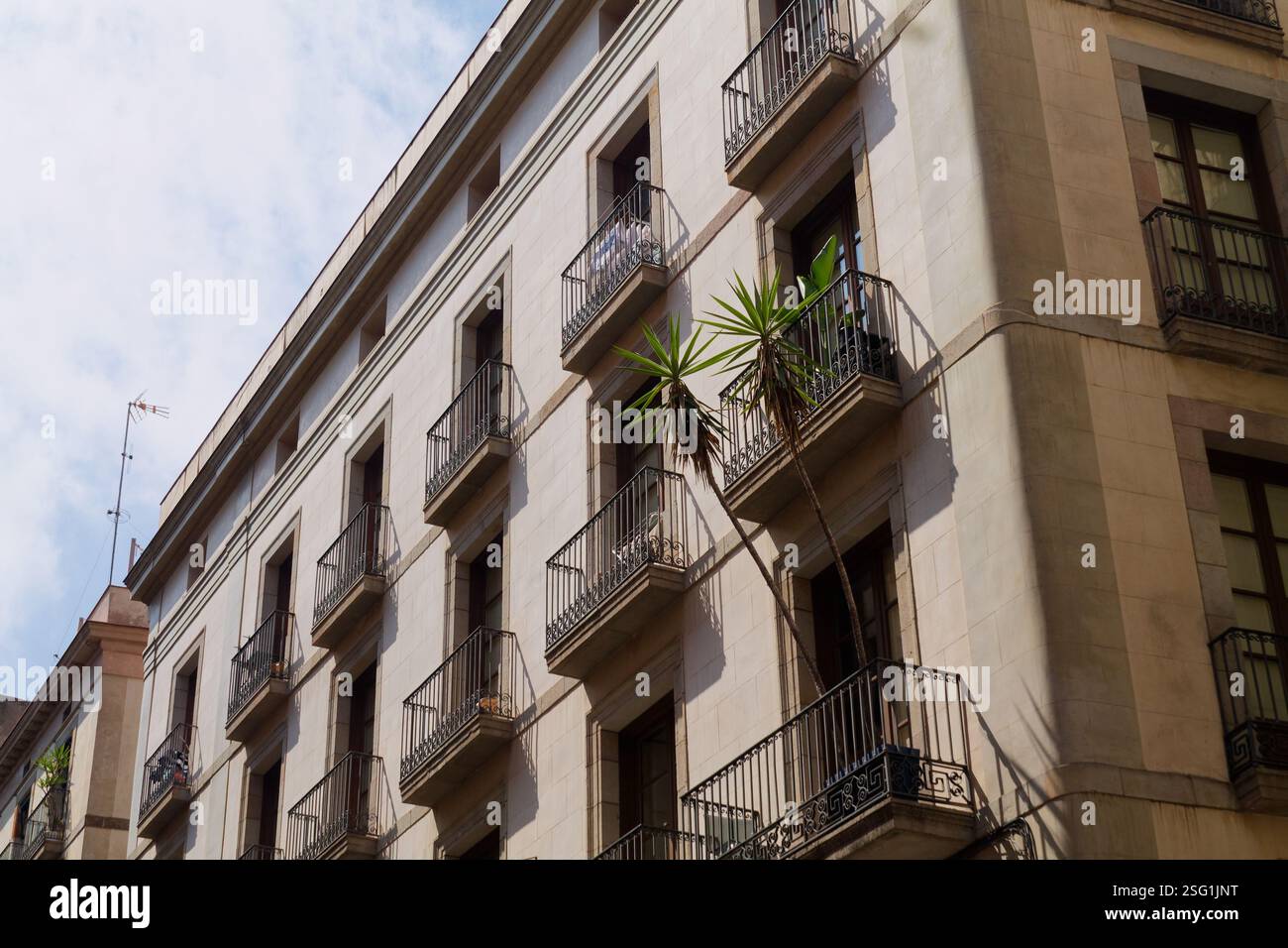A close-up view of a classic building facade featuring multiple ...