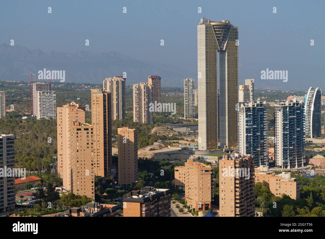 A panoramic view of a modern city skyline featuring tall buildings and ...
