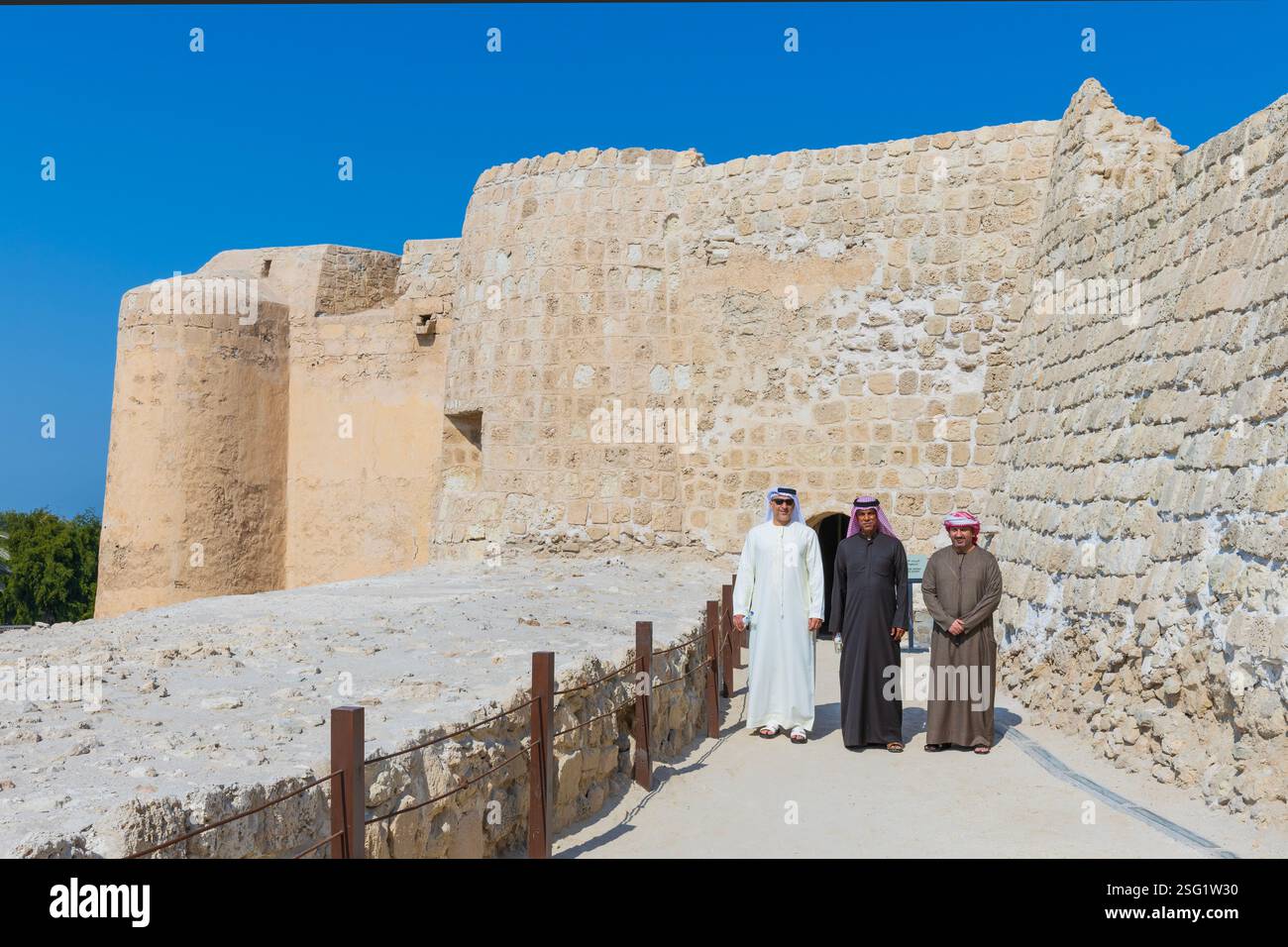 Arab men in traditional attire at Qal'at al-Bahrain also known as ...