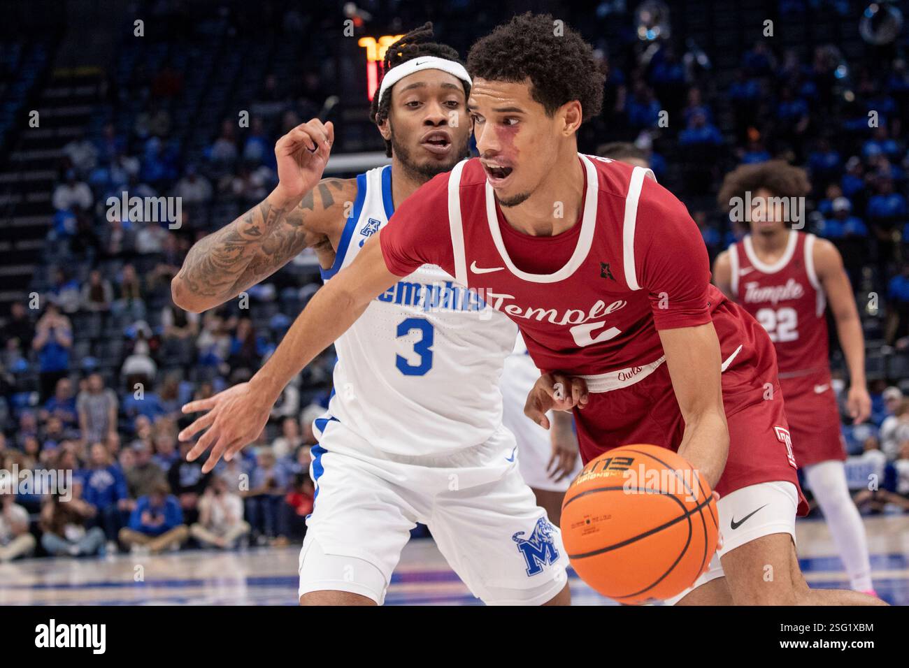 Memphis guard Colby Rogers (3) defends against Temple forward Steve ...
