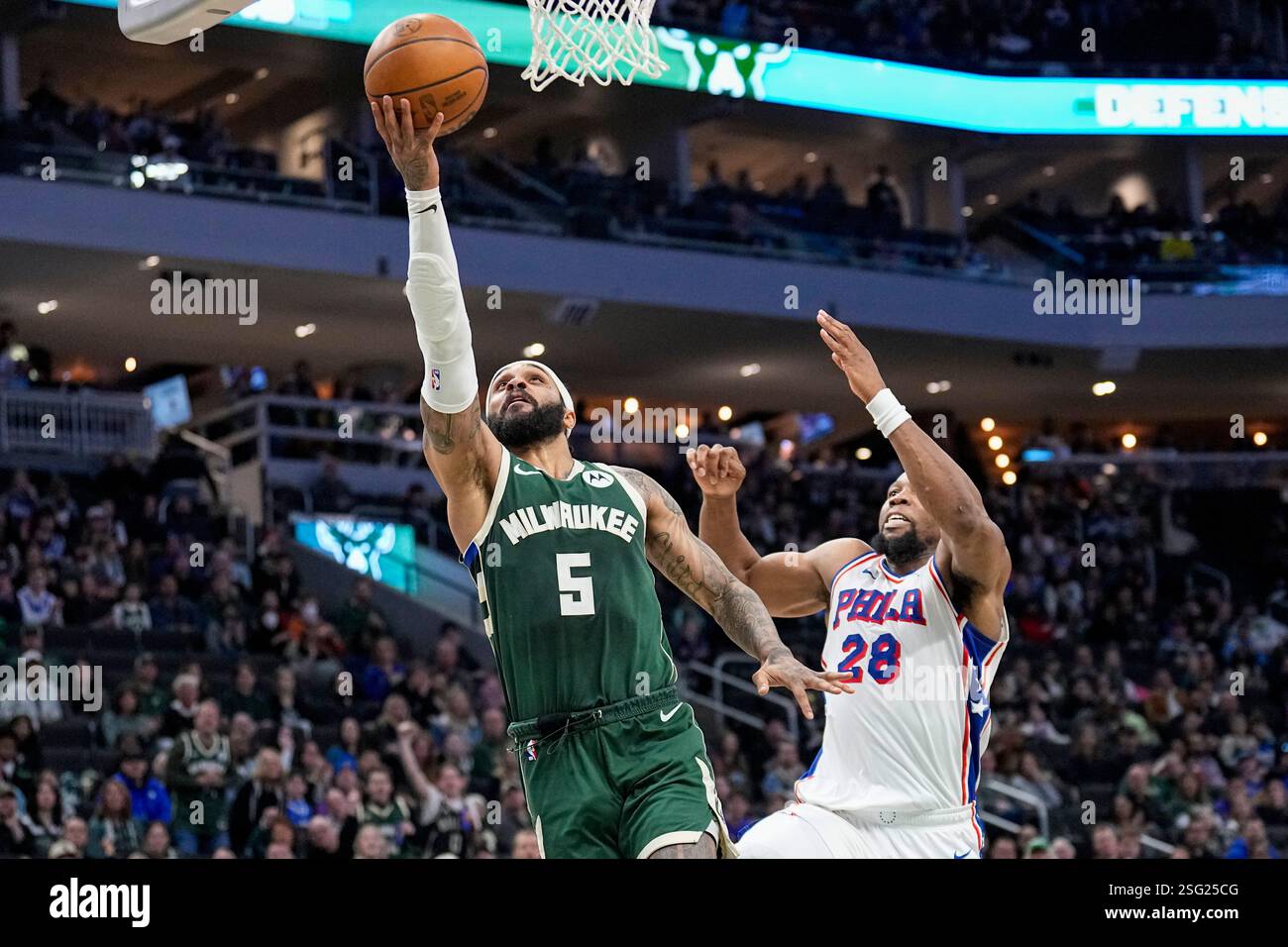 Milwaukee Bucks' Gary Trent Jr. (5) shoots against Philadelphia 76ers ...