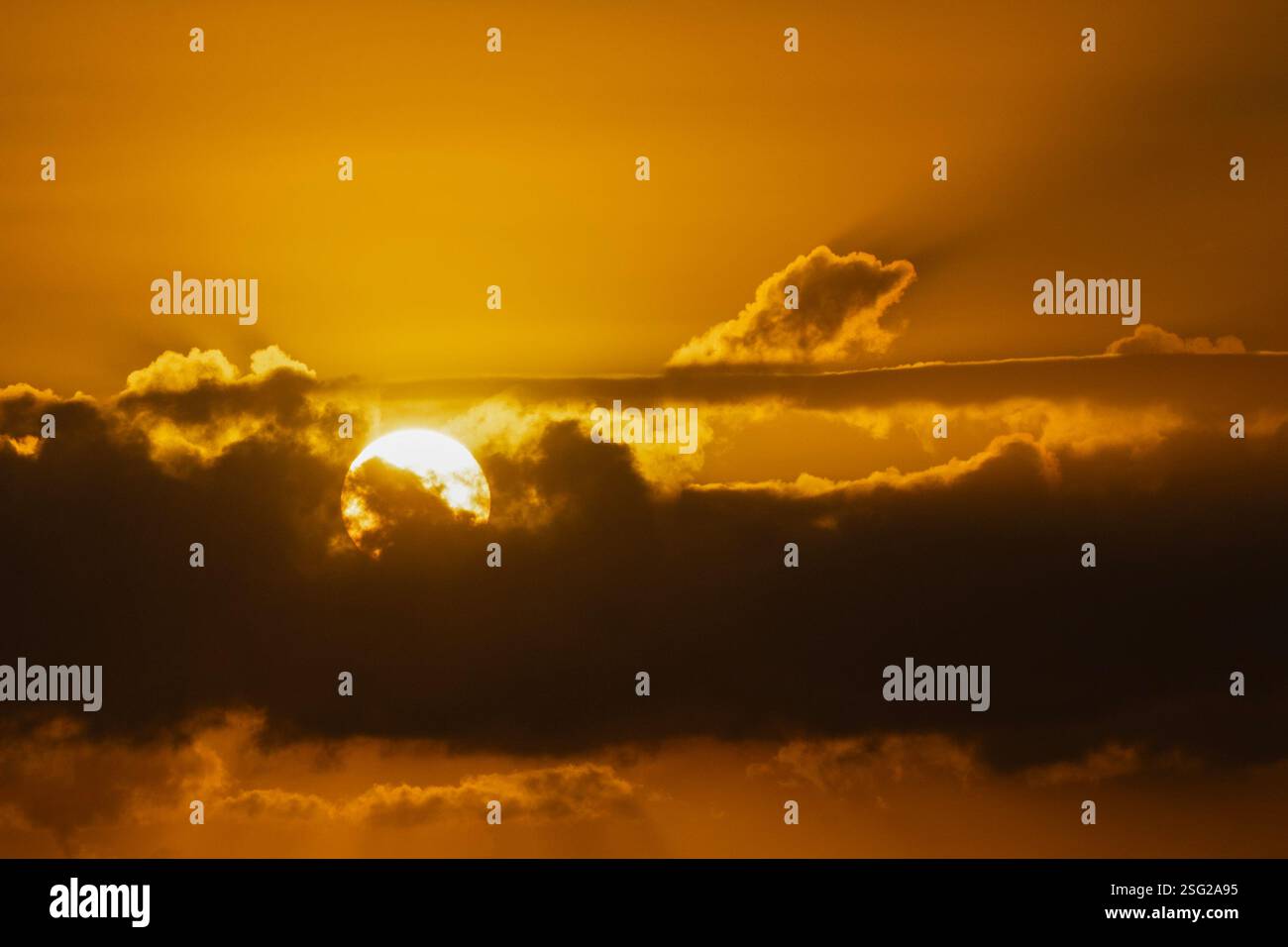 Sun rises behind layer hi-res stock photography and images - Alamy