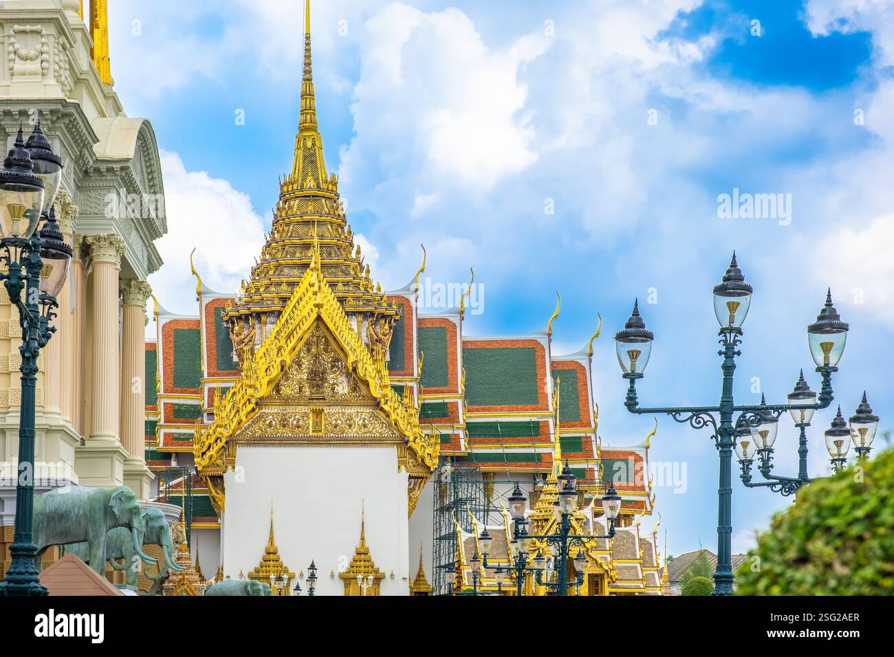 Ornate golden rooftops of Grand Palace in Bangkok, Thailand, showcasing ...