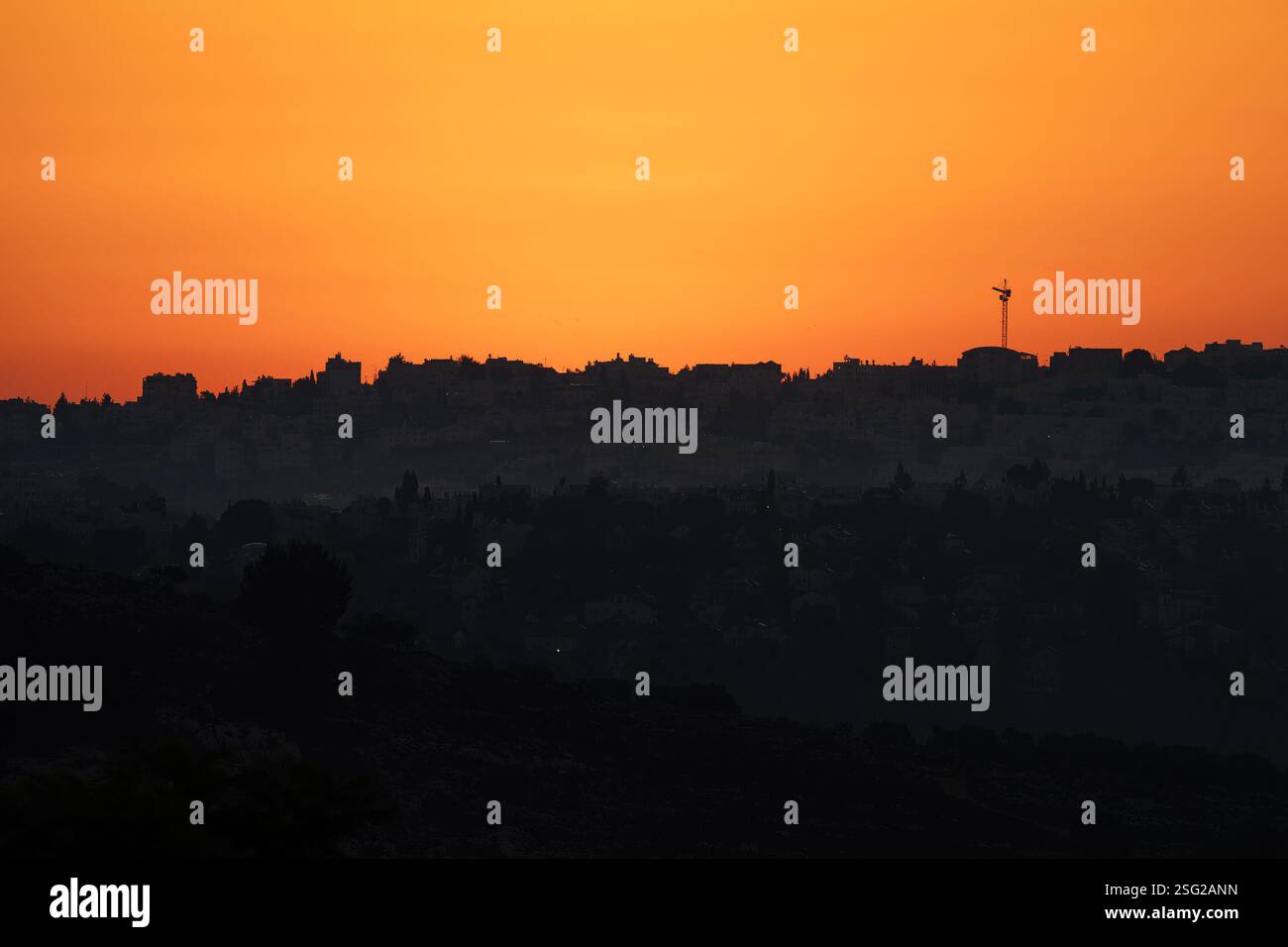 Jerusalem, Israel, and the Judea mountains on a hazy dawn, moments ...