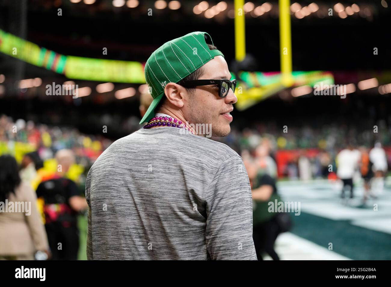 Pete Davidson watches warmups before the NFL Super Bowl 59 football ...