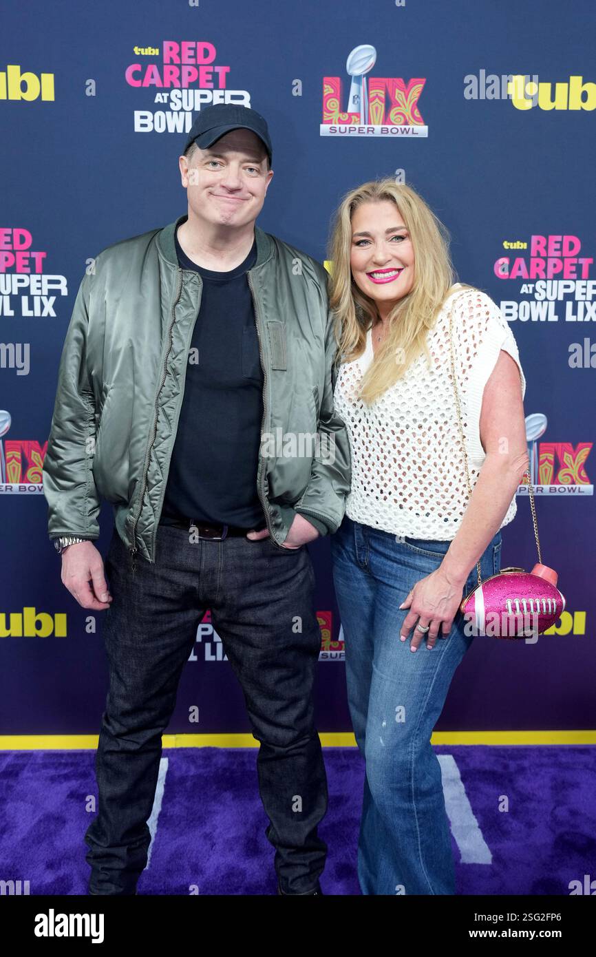 Brendan Fraser and his wife Afton Smith walk the Tubi Purple Carpet ...
