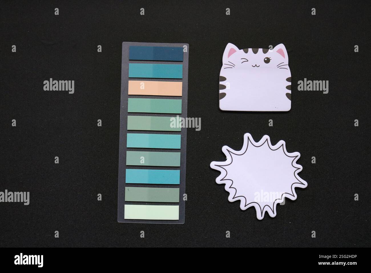 Stickers on a black background Stock Photo - Alamy