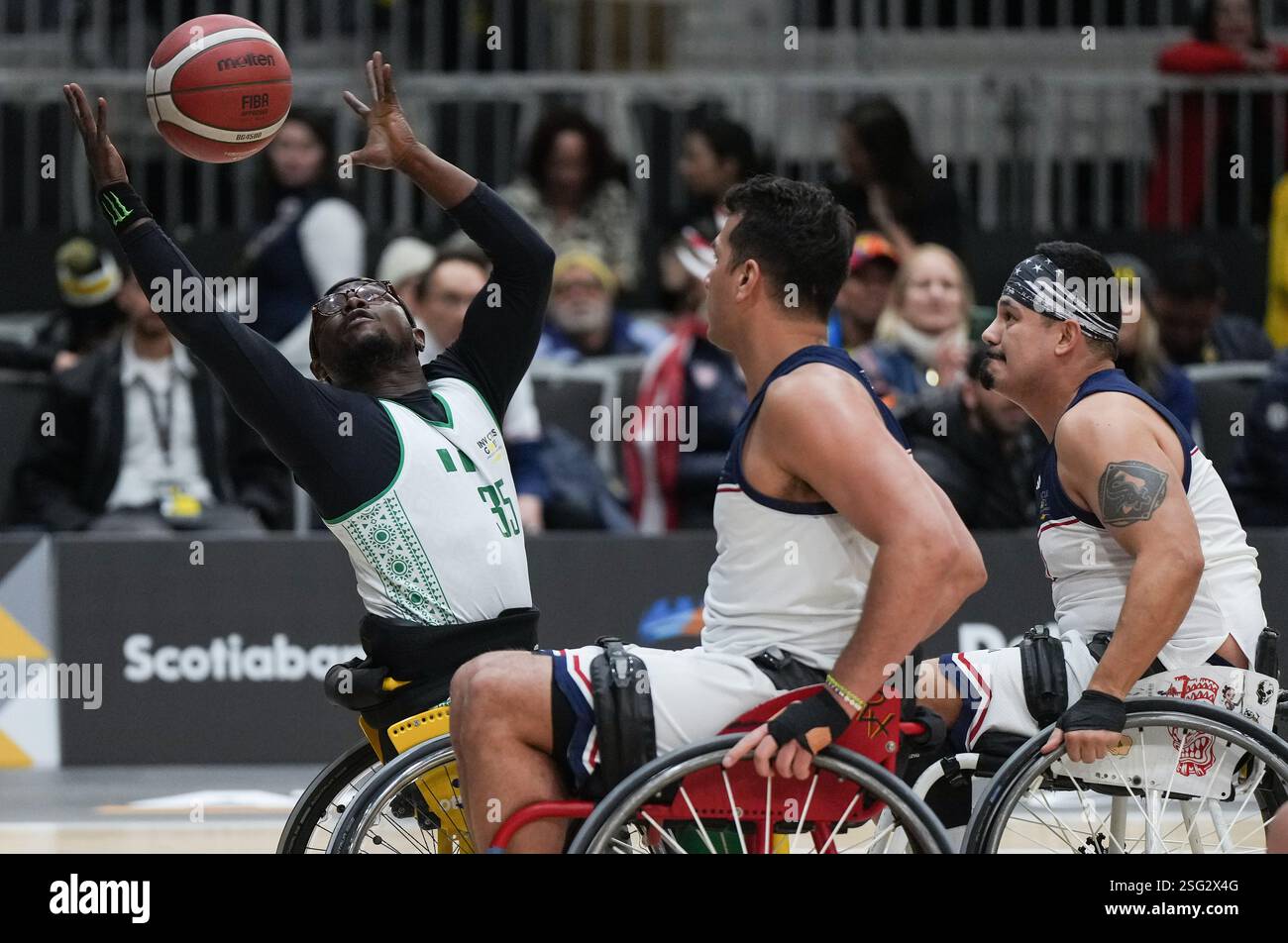 Vancouver, Canada. 09th Feb, 2025. Nigeria's Goza Dazzi, left, vies for ...