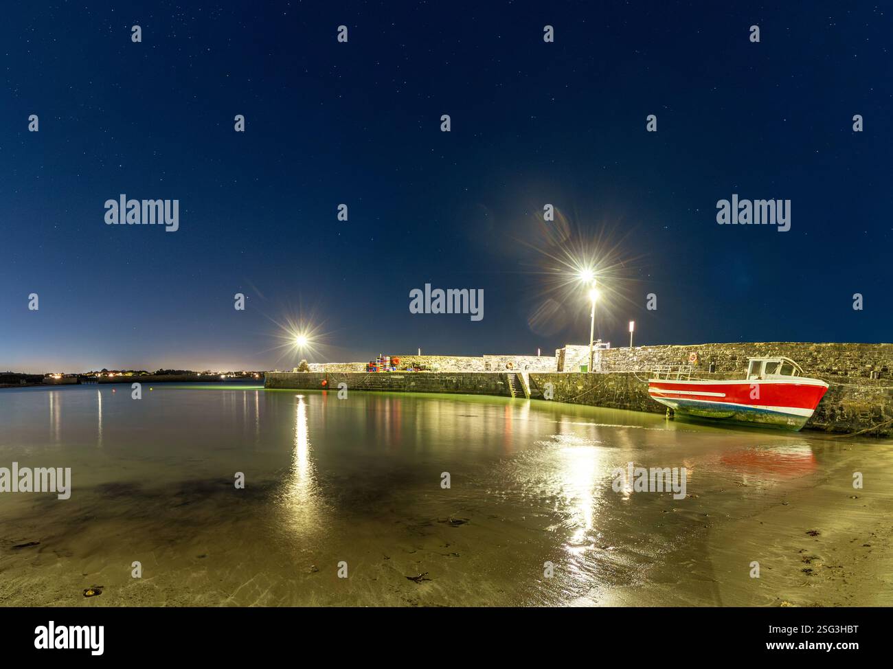 Clear night sky over Rush Harbour Stock Photo - Alamy