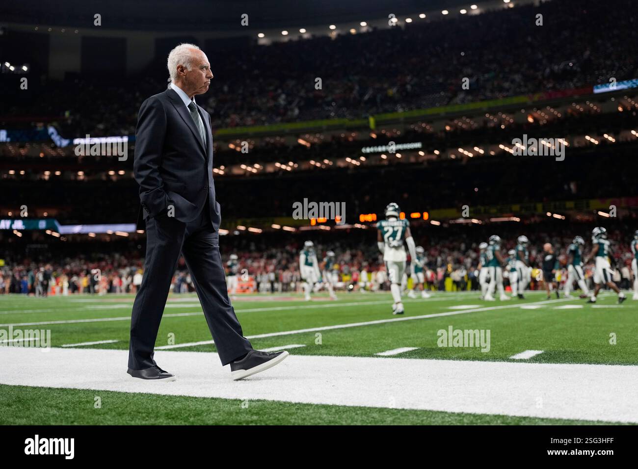 Philadelphia Eagles owner Jeffrey Lurie walks along the sideline before ...