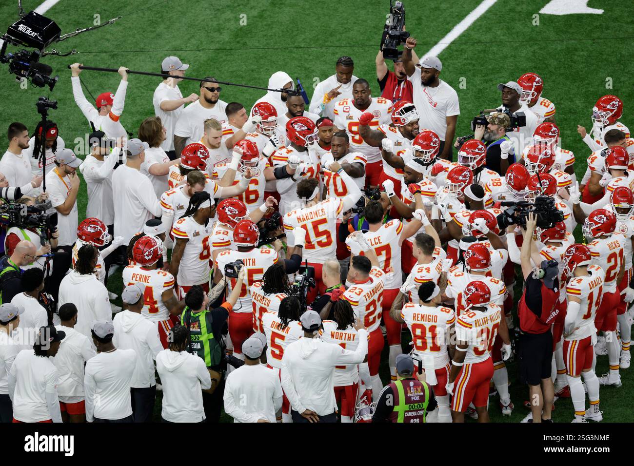 The Kansas City Chiefs huddle up before the NFL Super Bowl 59 football ...