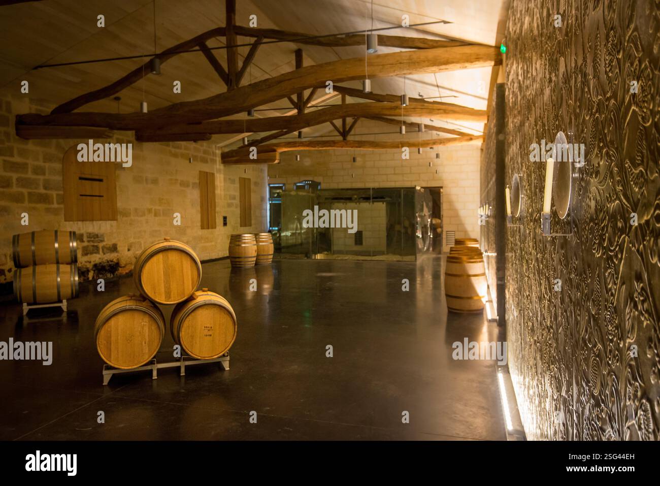 Exploring a rustic French wine cellar with oak barrels and textured ...