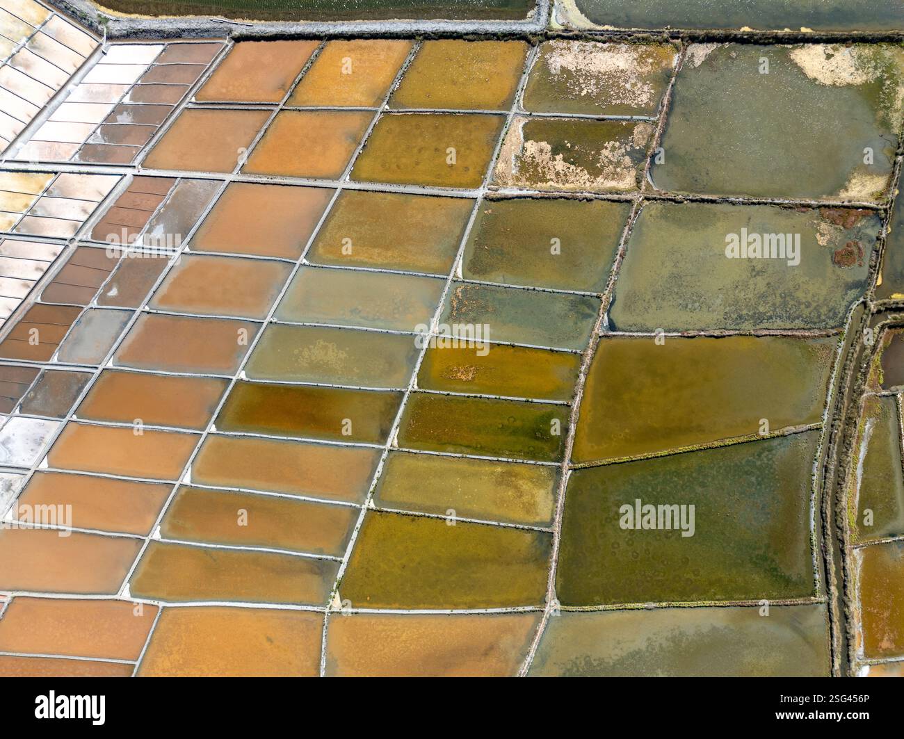 Traditional salt extraction camp (Salinas) with piles of extracted salt ...