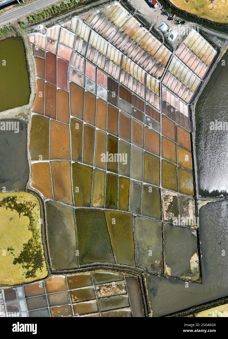 Traditional salt extraction camp (Salinas) with piles of extracted salt ...