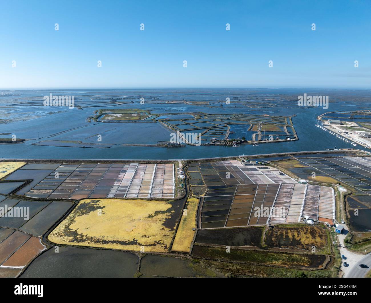 Traditional salt extraction camp (Salinas) with piles of extracted salt ...