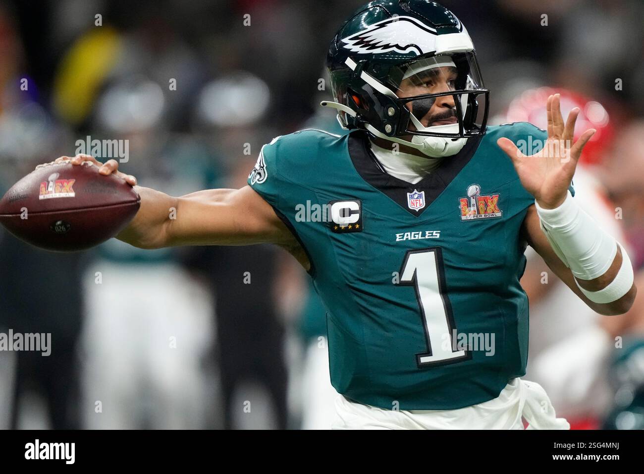 Philadelphia Eagles quarterback Jalen Hurts looks to throw against the Kansas City Chiefs during ...