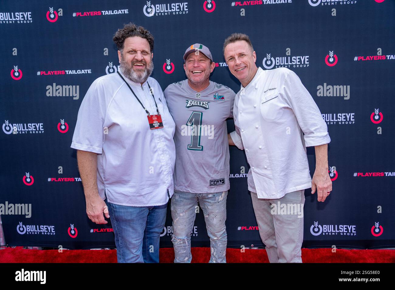 Chefs Aaron May, left, fan, and Marc Murphy attend The Players Tailgate ...