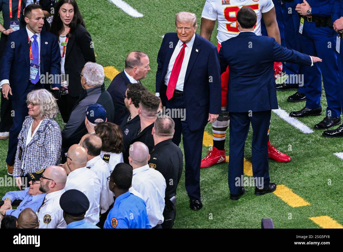 New Orleans, USA. 09th Feb, 2025. President Donald Trump walks on the ...