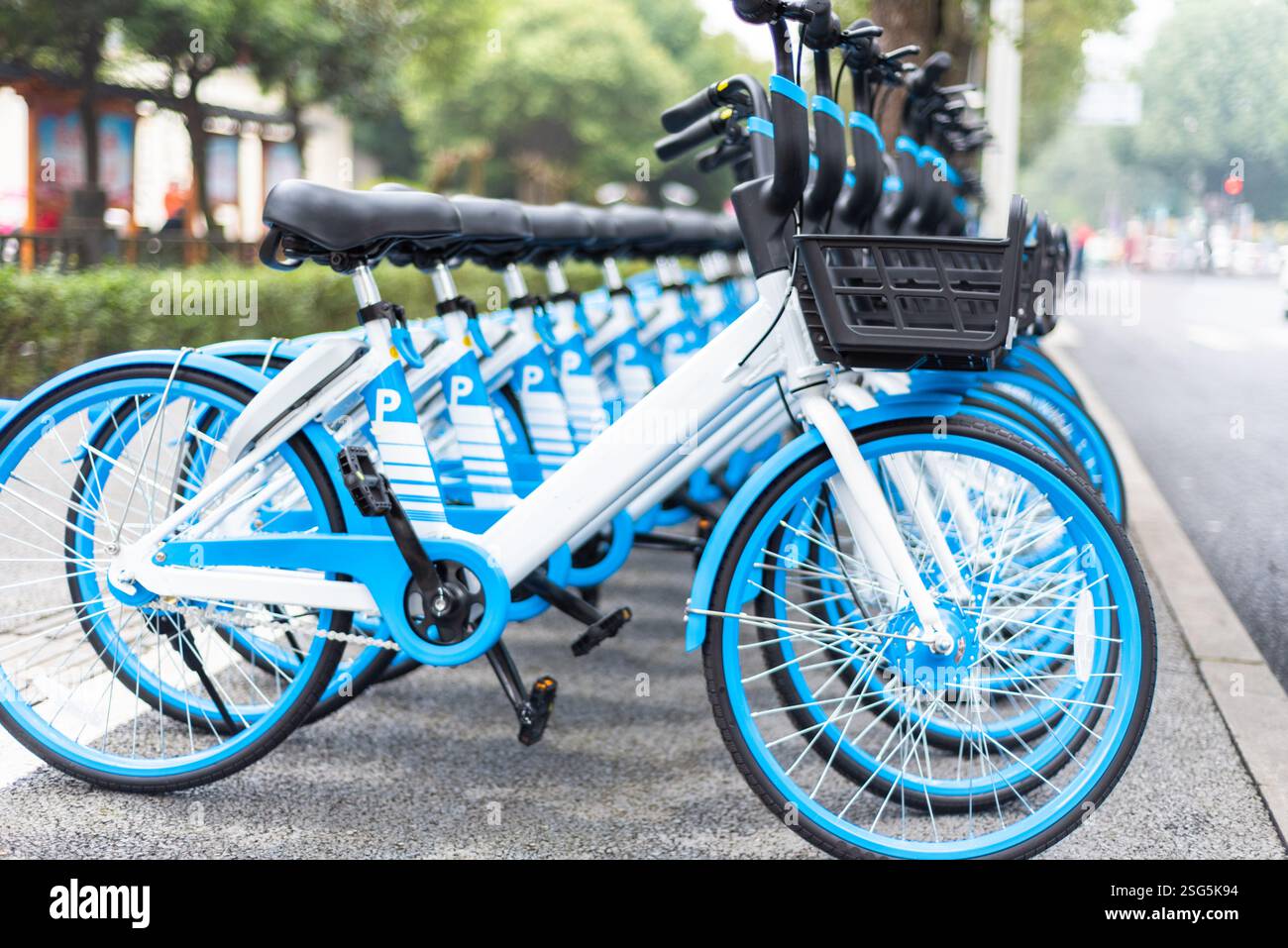 Shared bicycles parked on the roadside in Chengdu, China Stock Photo ...
