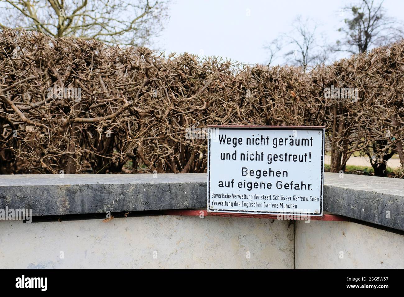 Sign at the Munich, Germany Court Garden or Hofgarten, warning visitors ...