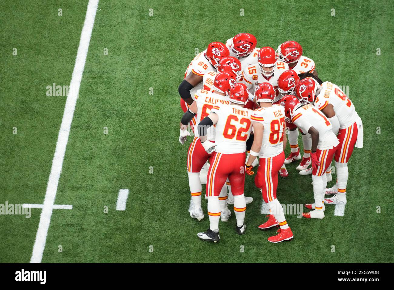 The Kansas City Chiefs huddle up during the NFL Super Bowl 59 football ...