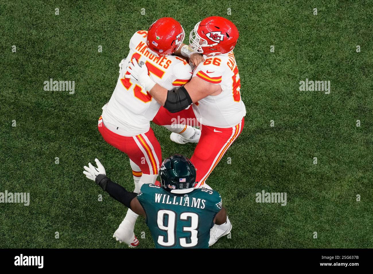 Kansas City Chiefs quarterback Patrick Mahomes (15) runs into guard ...