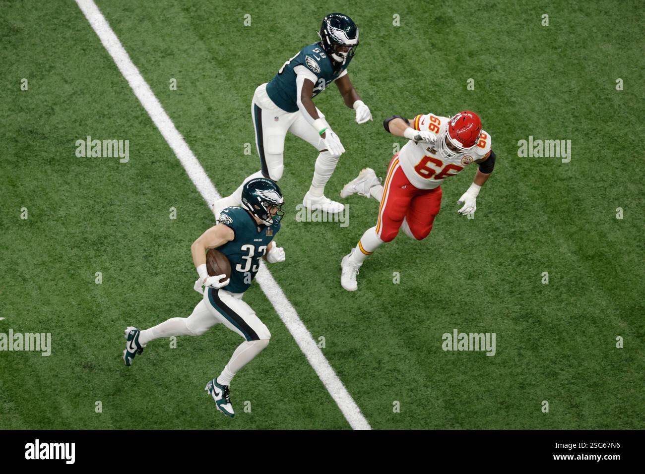 Philadelphia Eagles defensive back Cooper DeJean (33) runs the ball in ...