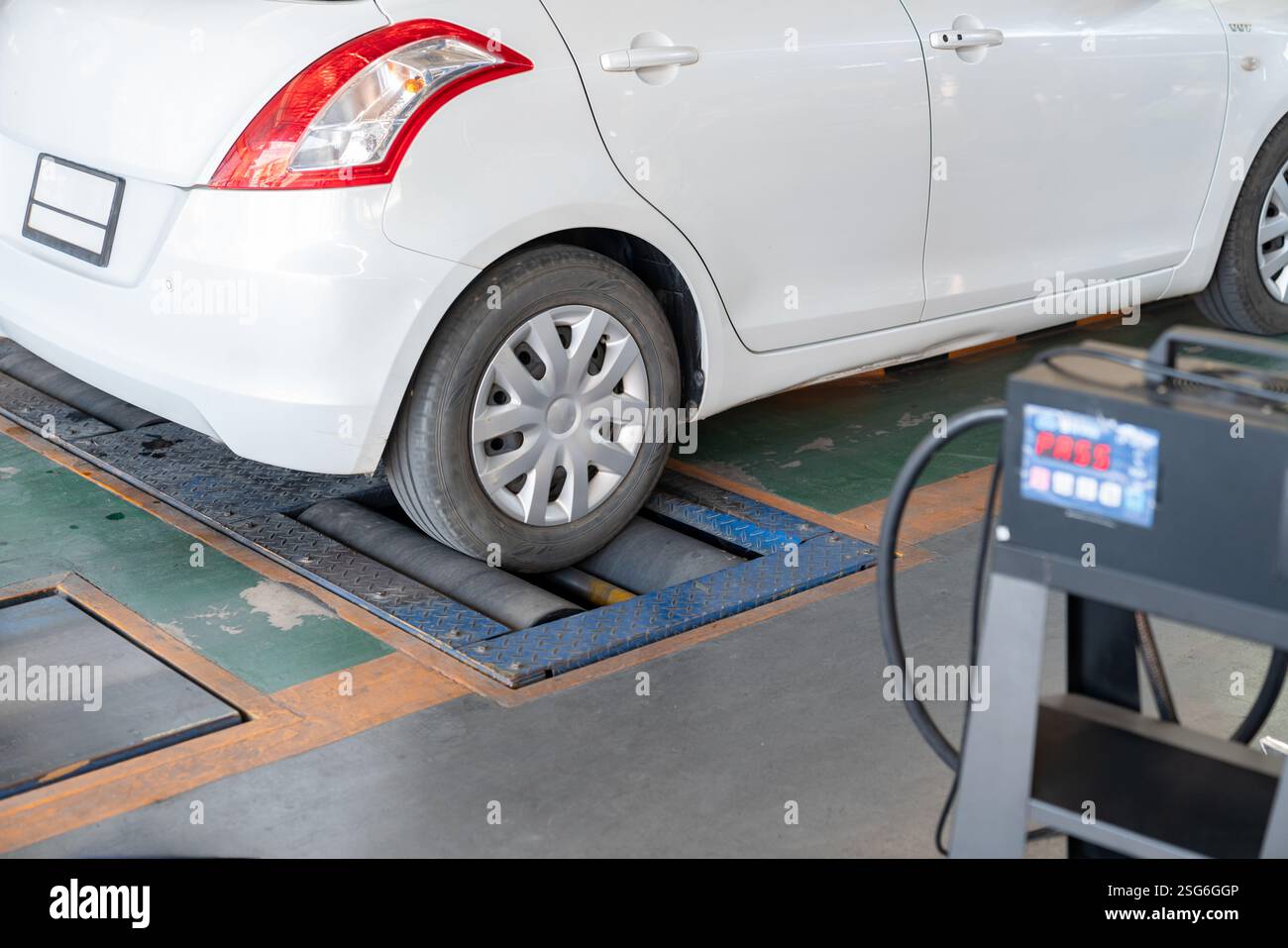 Annual vehicle inspection before the tax renewal by testing the wheel ...