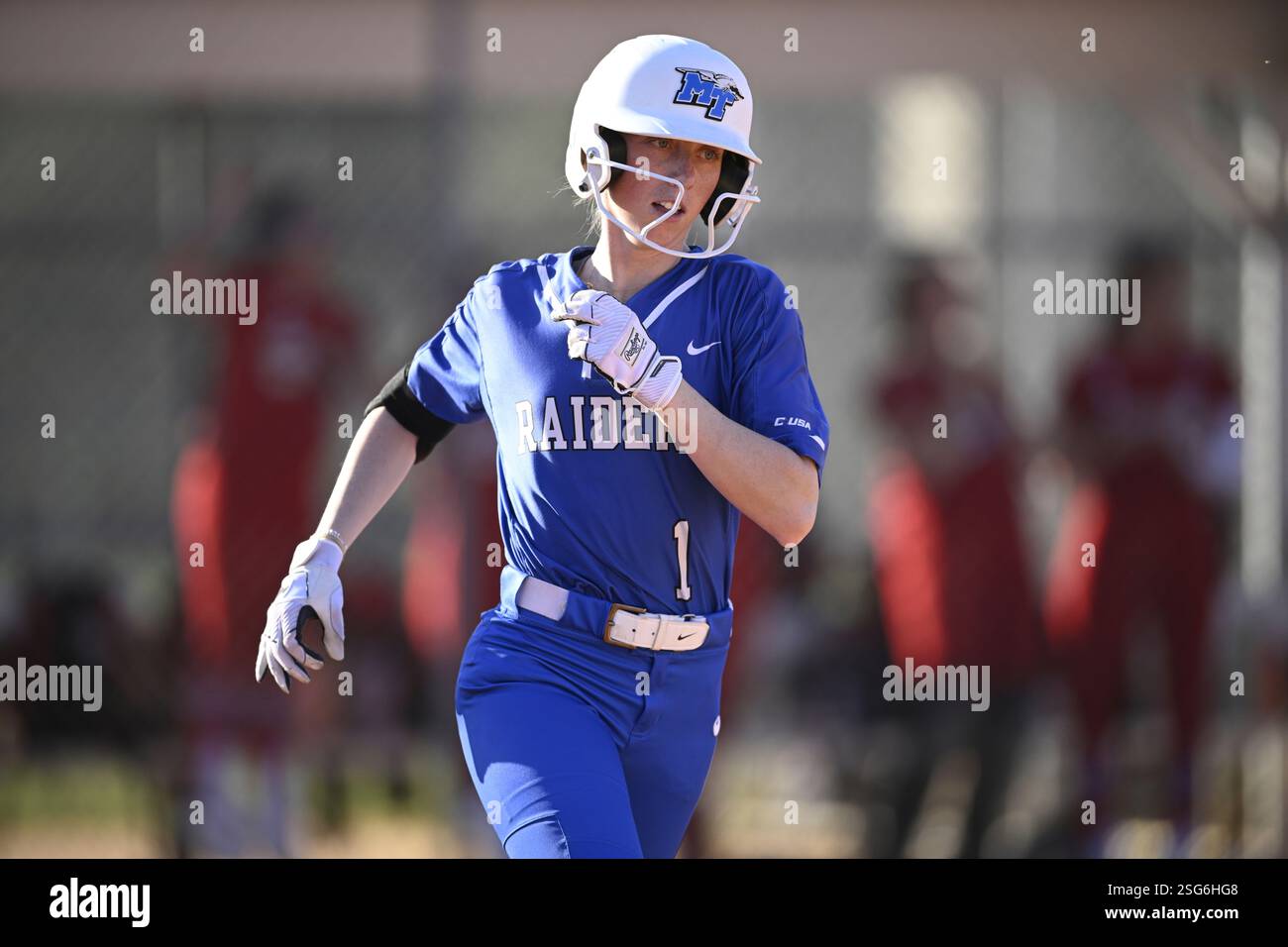 Middle Tennessee State's Addy Edgmon (1) runs after hitting a pitch ...