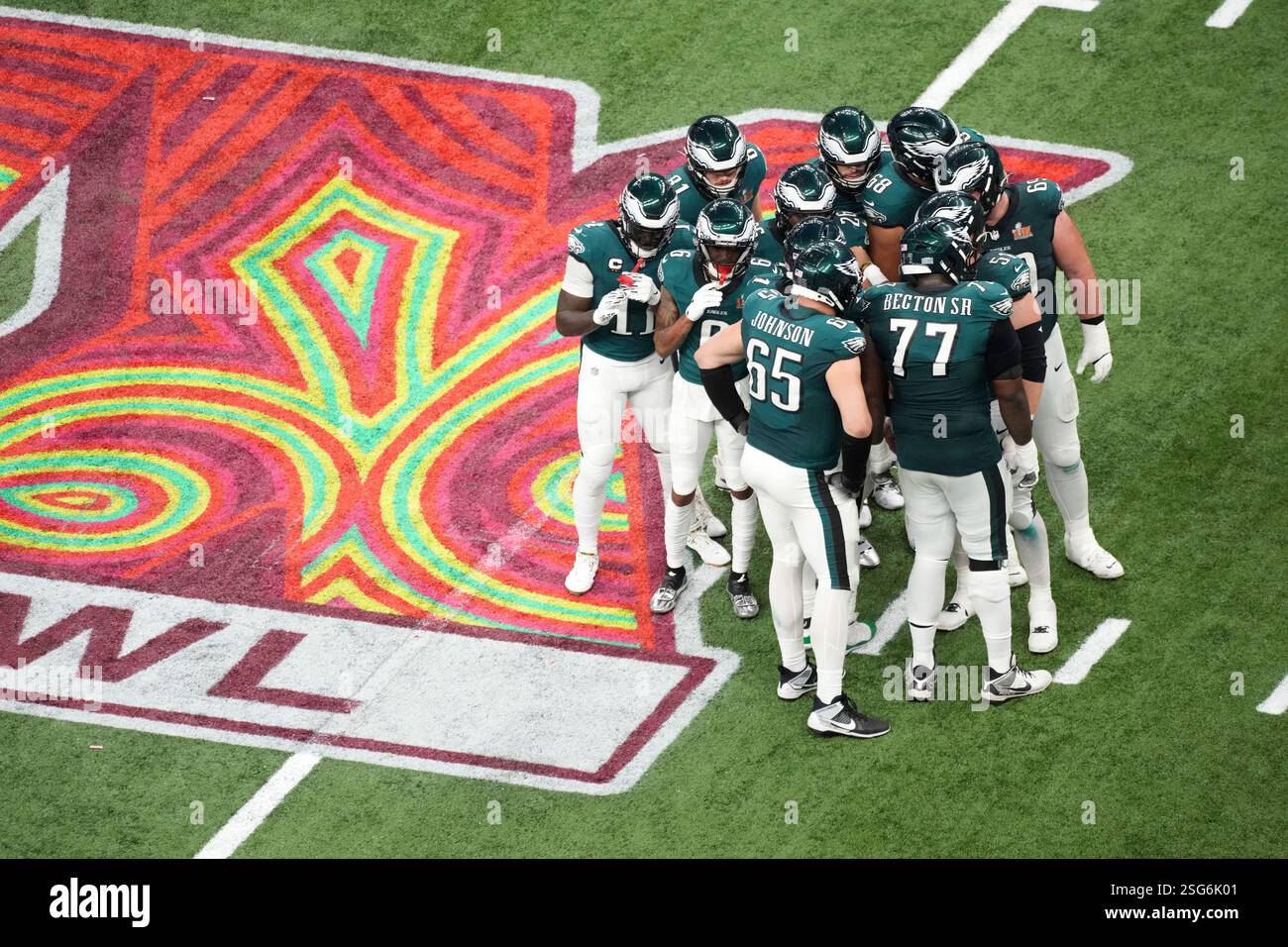 The Philadelphia Eagles huddle up during the NFL Super Bowl 59 football ...
